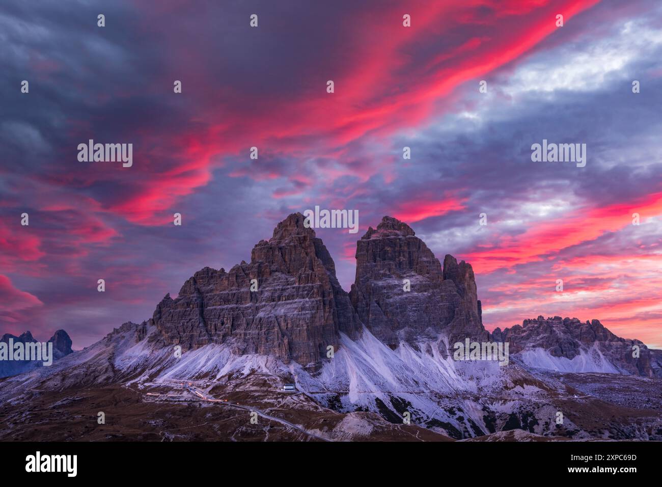 Incredible purple sunset at Three peaks of Lavaredo mountains. Auronzo ...