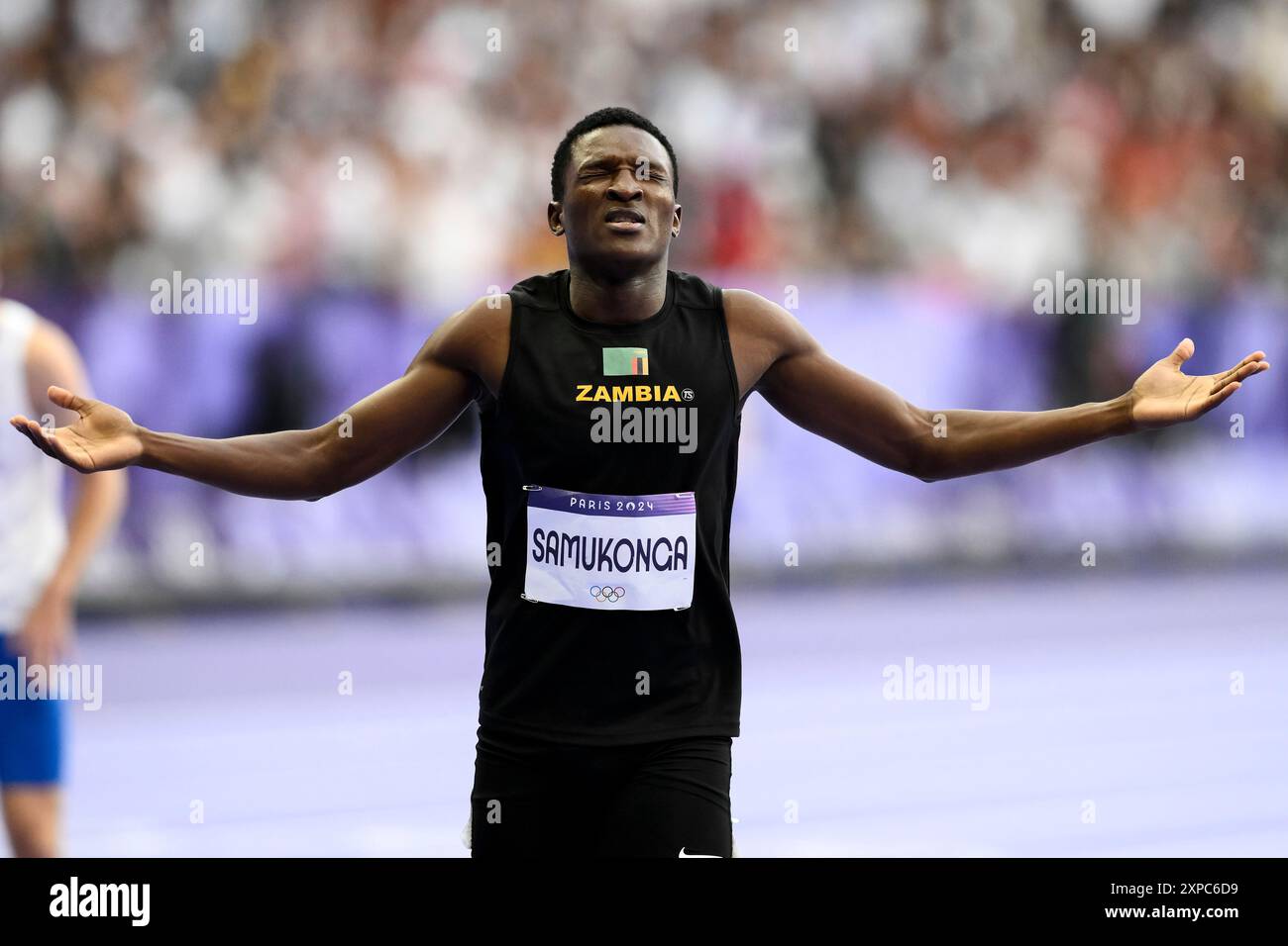 Muzala Samukonga of Zambia reacts after competing in the 400m men first ...