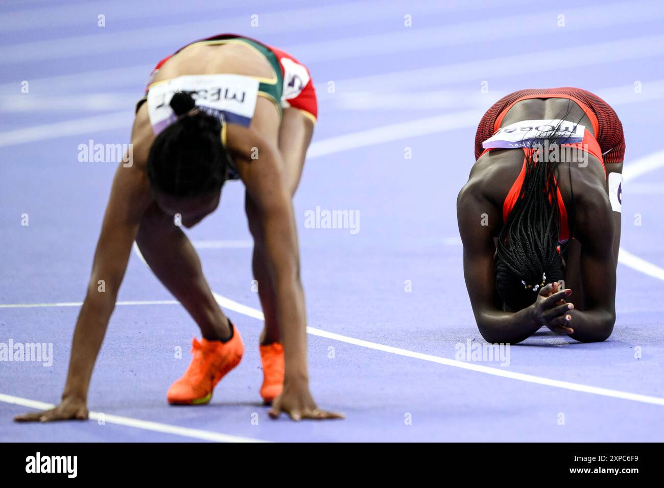 Worknesh Mesele of Ethiopia and Mary Moraa of Kenya react after ...