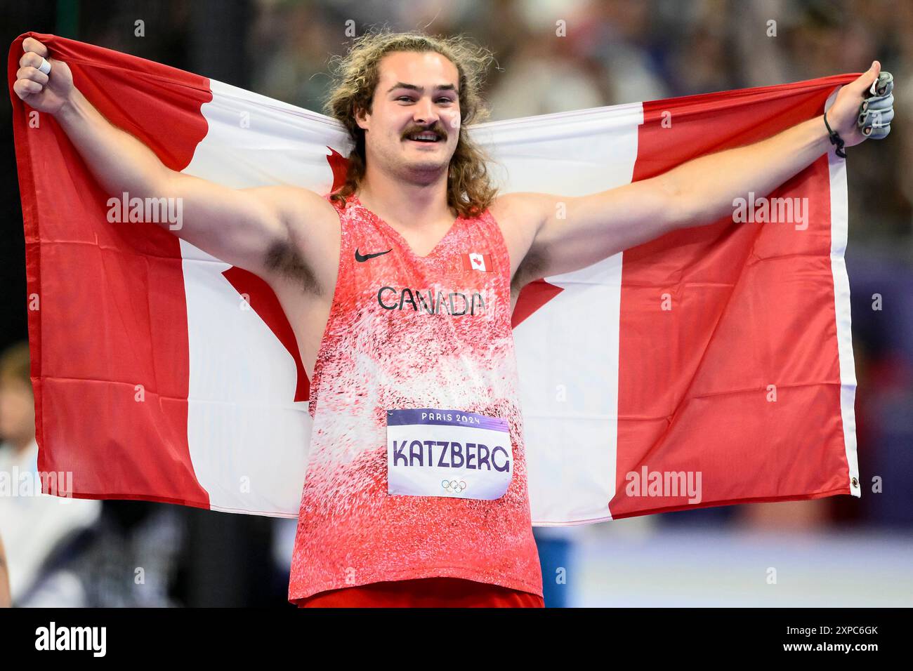 Ethan Katzberg of Canada celebrates after winning the men's Hammer ...