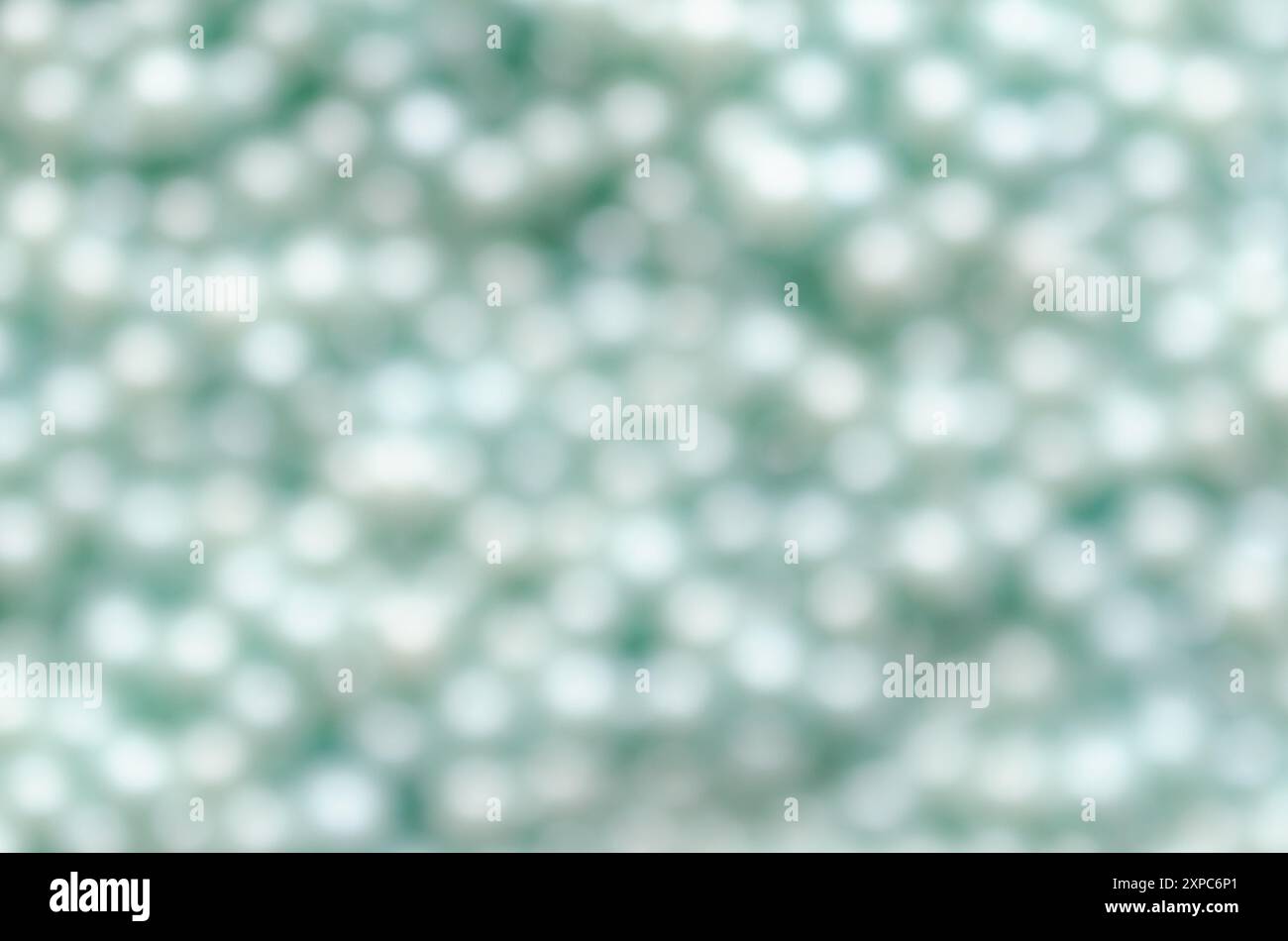 Abstract background of blurred light blue pearls Stock Photo - Alamy