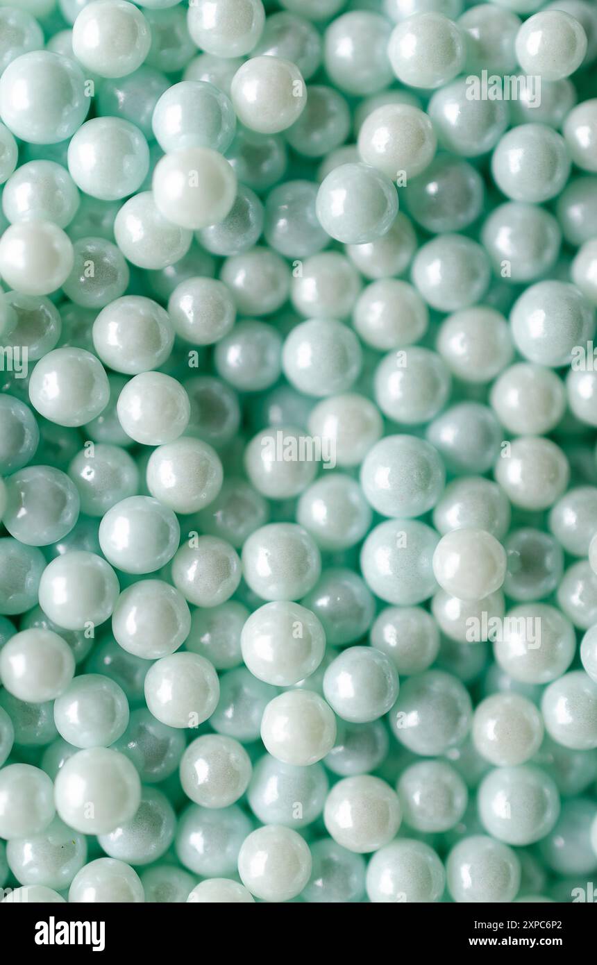 Background of light blue edible pearls in a vertical format Stock Photo ...