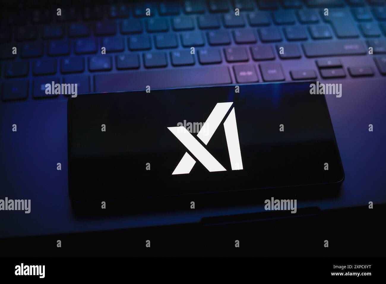 In this photo illustration, the xAI logo is displayed on a smartphone ...
