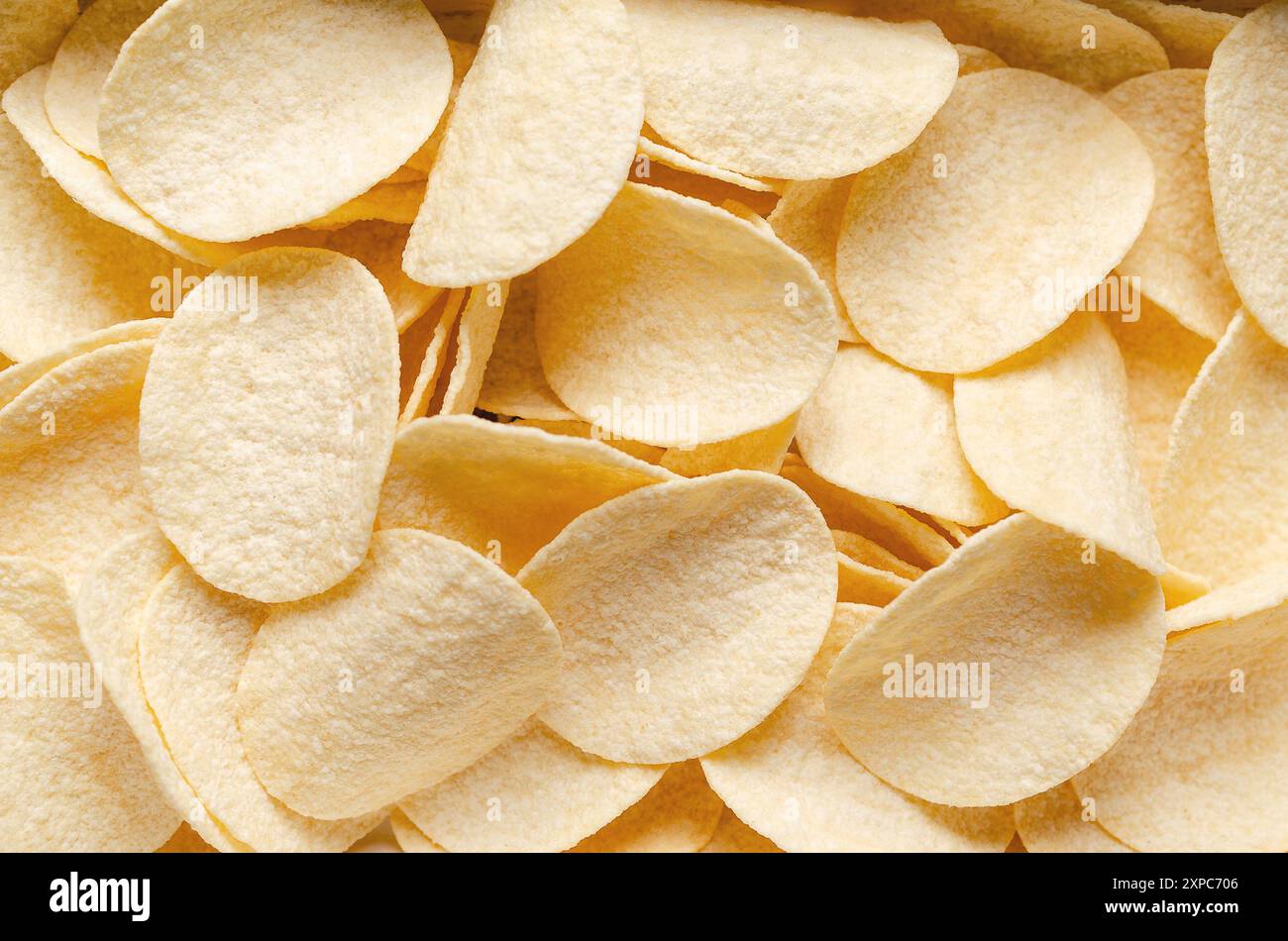 Background of a bunch potato chips. Rectangular format Stock Photo - Alamy