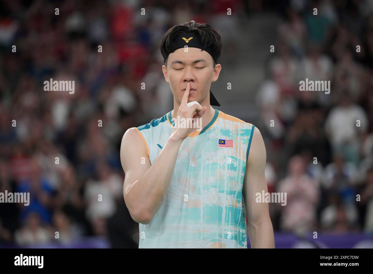 Malaysia's Lee Zii Jia celebrates after defeating India's Lakshya Sen ...