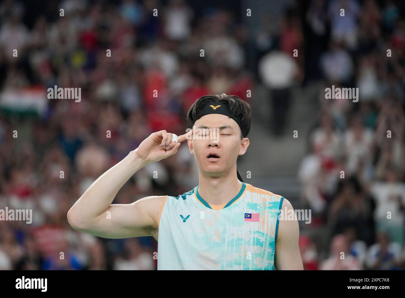 Malaysia's Lee Zii Jia celebrates after defeating India's Lakshya Sen ...