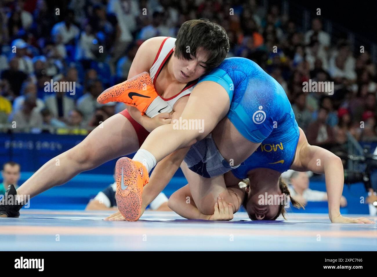 North Korea's Sol Gum Pak and Moldova's Irina Ringaci, right, compete ...