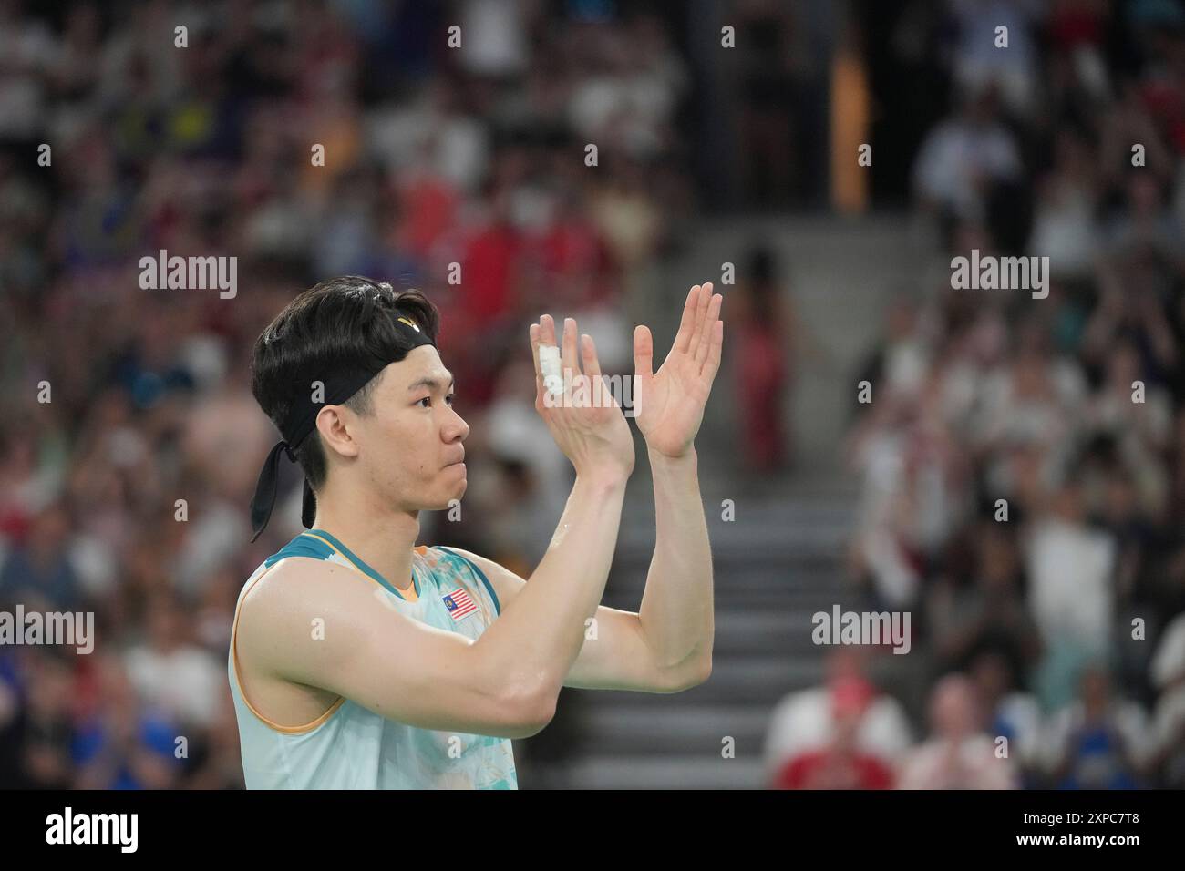 Malaysia's Lee Zii Jia celebrates after defeating India's Lakshya Sen ...