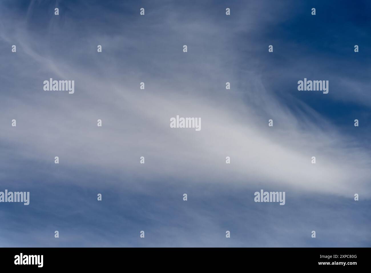 Wispy Cirrus Clouds in a Blue Sky Stock Photo - Alamy