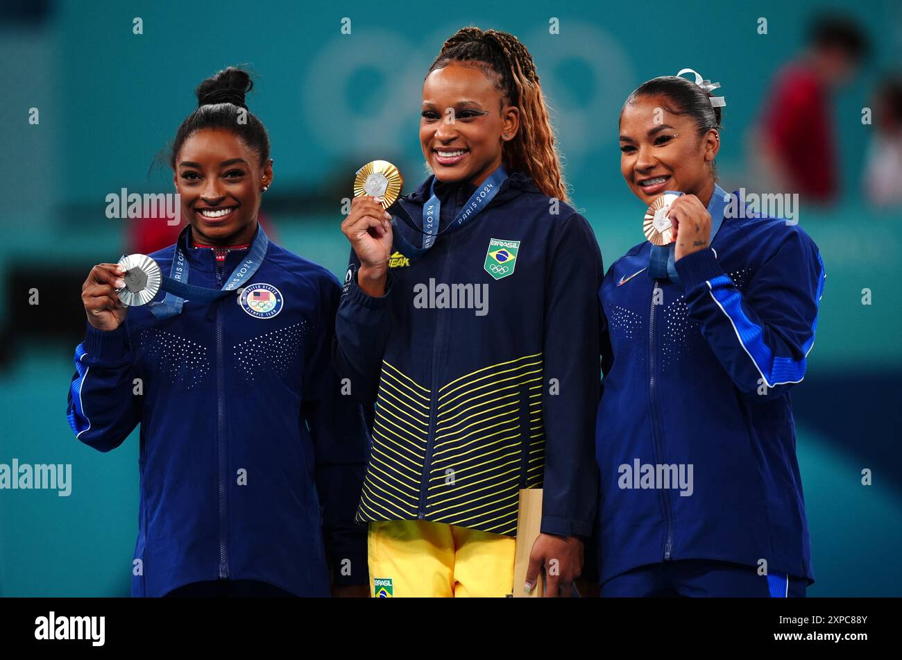 Gold medalist Rebeca Andrade (centre) of Brazil, silver medalist Simone ...