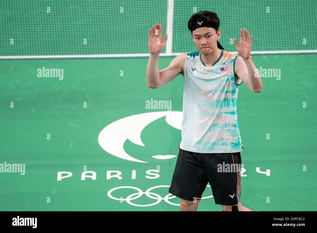 Malaysia's Lee Zii Jia celebrates after defeating India's Lakshya Sen ...