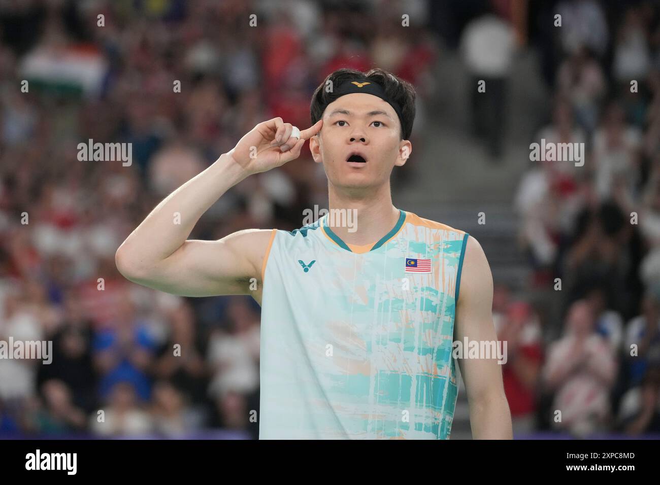 Malaysia's Lee Zii Jia celebrates after defeating India's Lakshya Sen ...