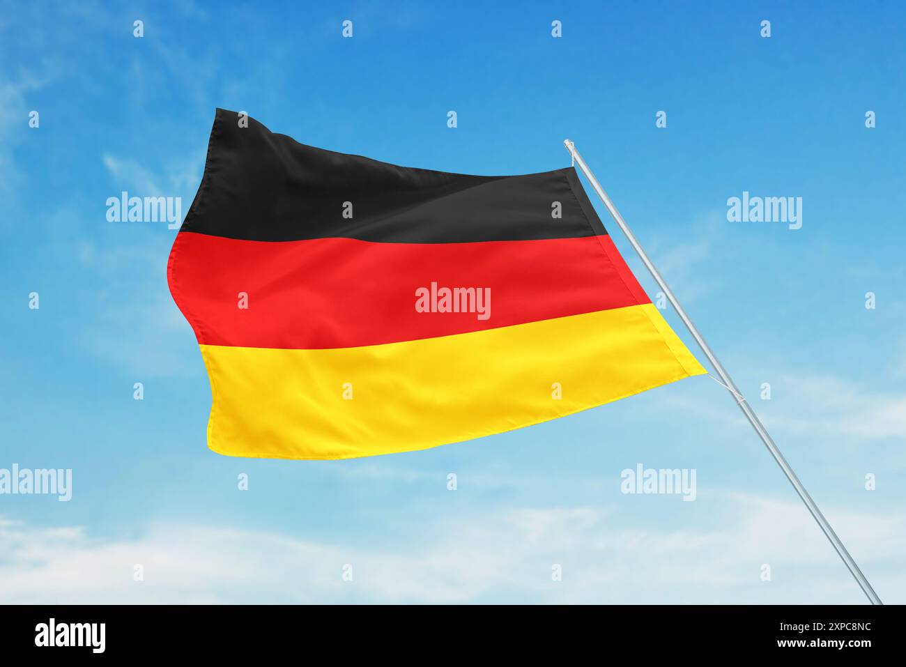 German flag flying proudly, representing national pride and unity. The ...