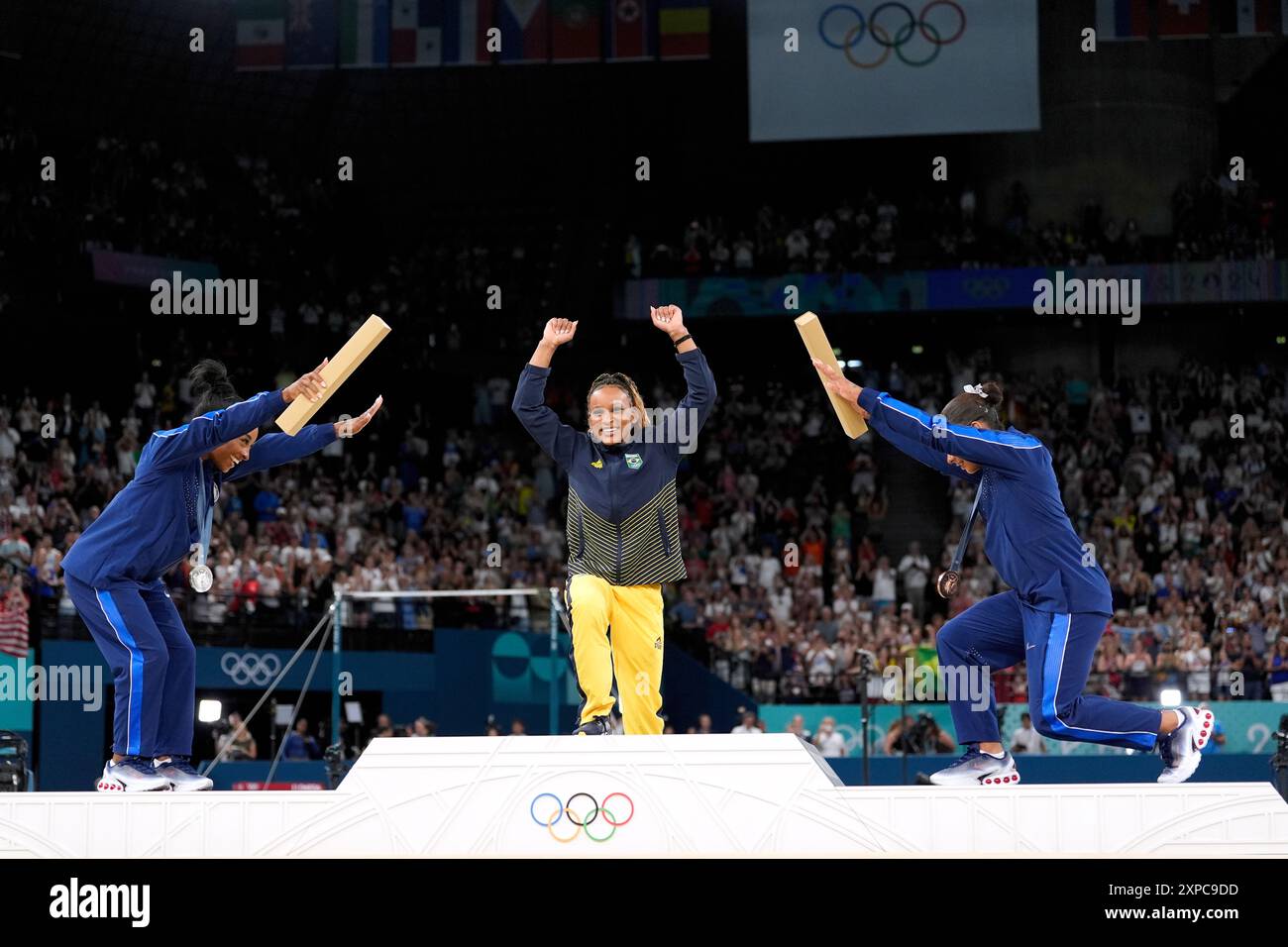 Silver medalist Simone Biles, of the United States, left, and bronze ...
