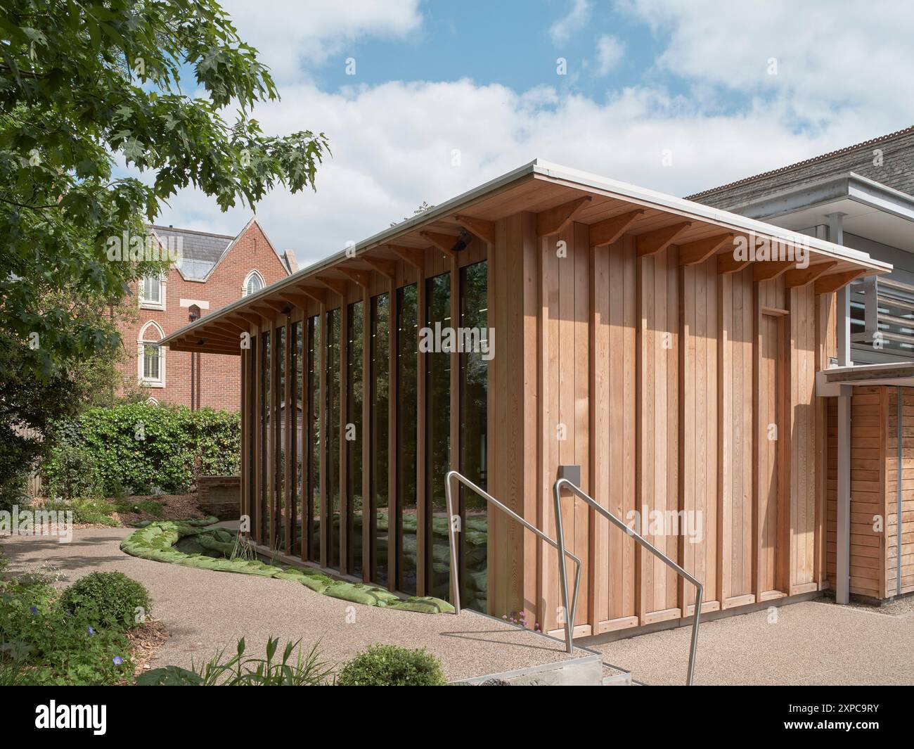Timber and glass facade on estate's grounds. Rambert School of Ballet ...
