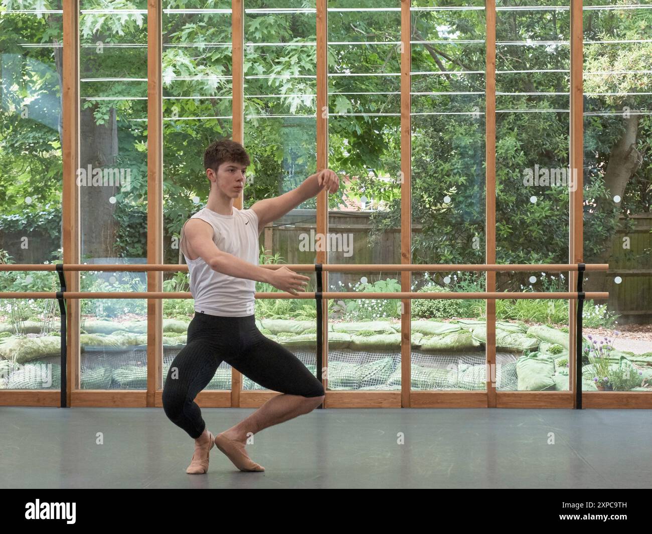 Practising dance in front of fenestration. Rambert School of Ballet ...