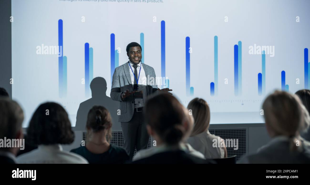 Successful Black Businessman Giving Presentation At International Business Conference. African ...