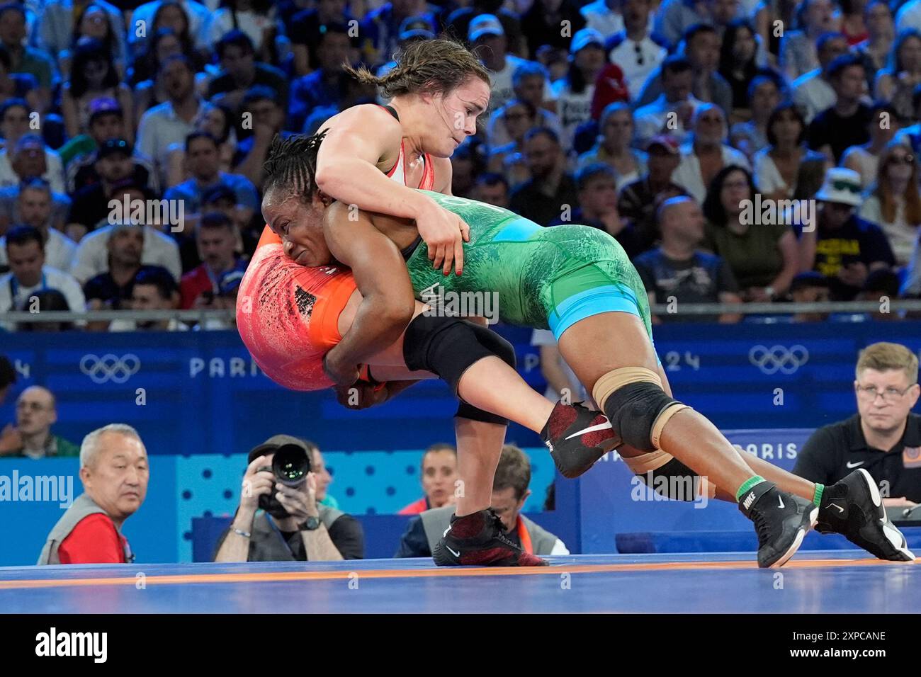 Canada's Linda Morais and Nigeria's Blessing Oborududu, right, compete ...