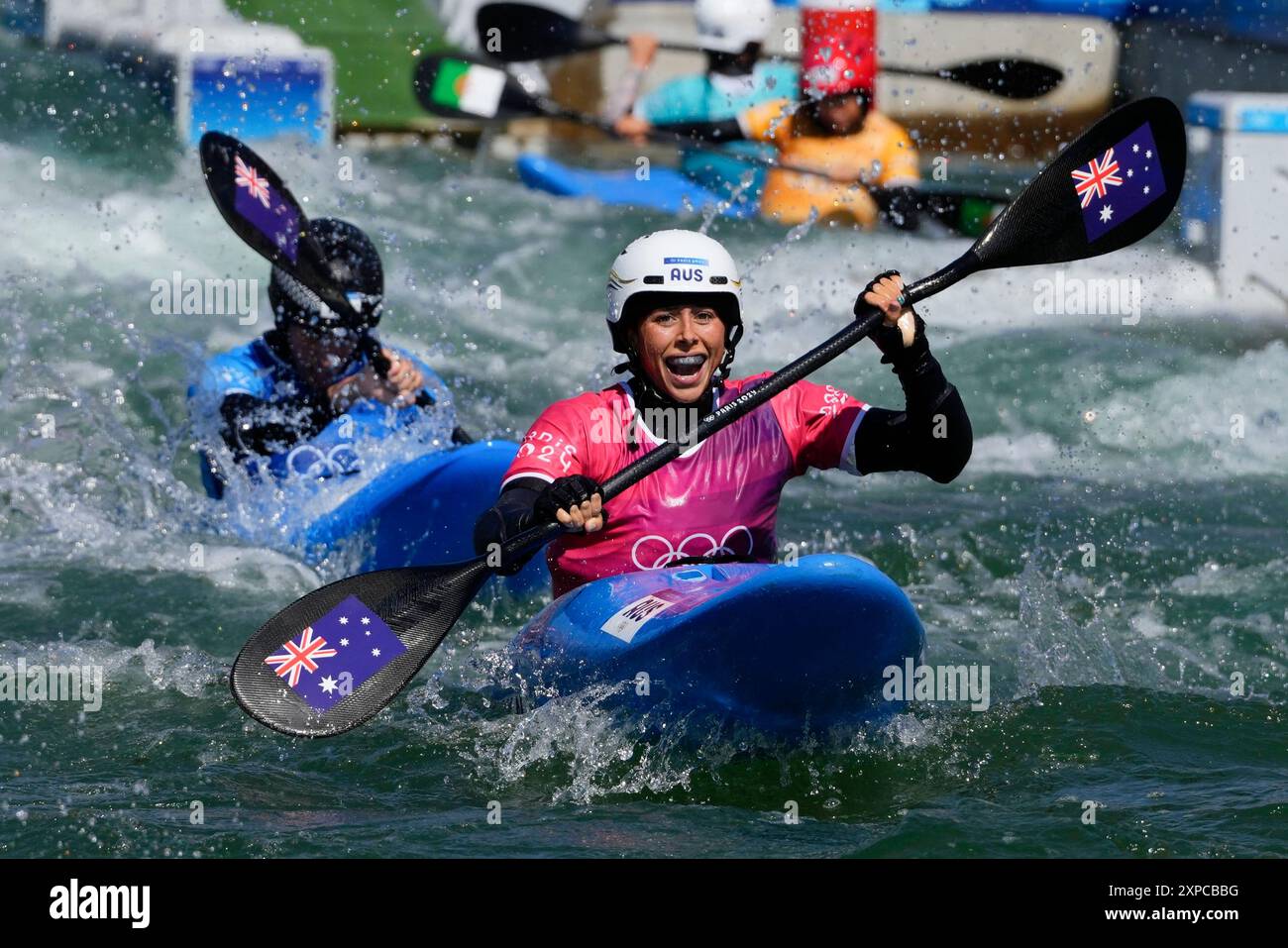 Noemie Fox of Australia reacts at the finish area of the women's kayak ...