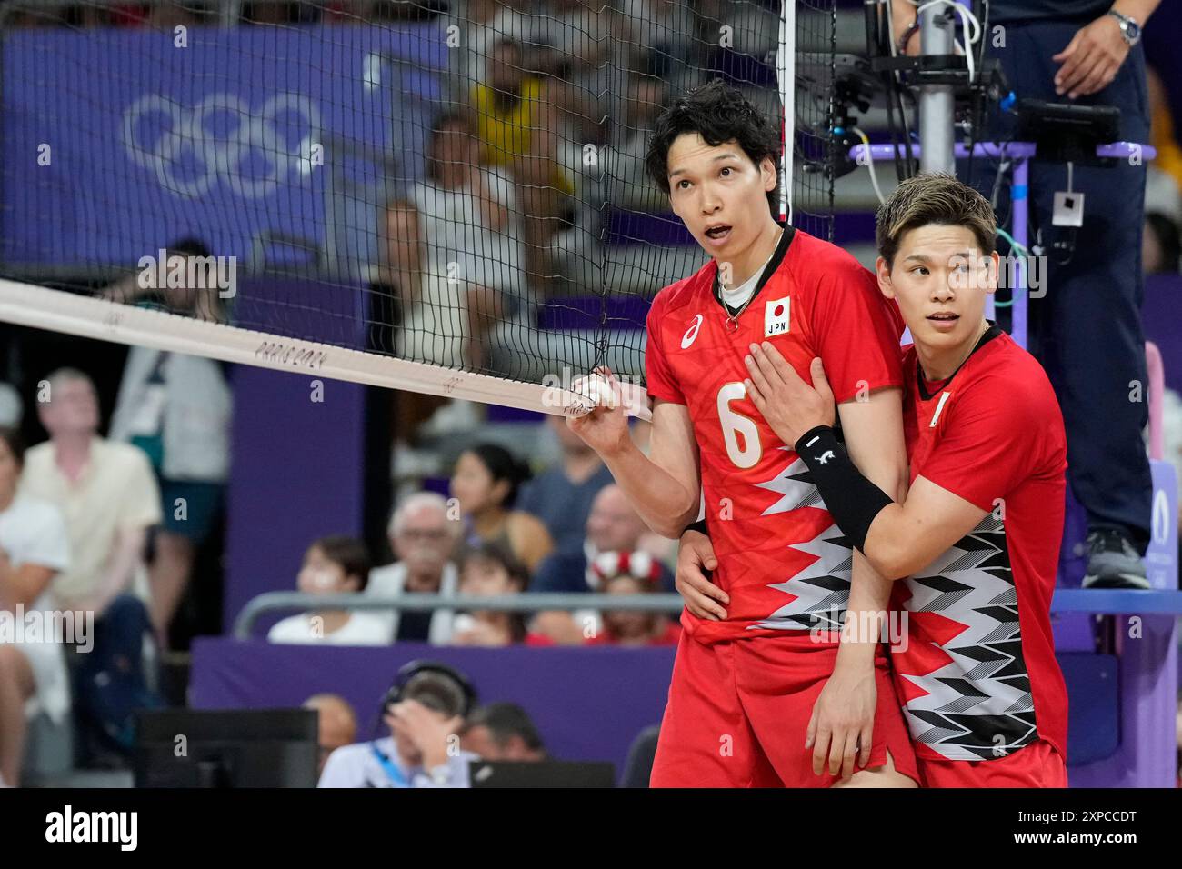 Akihiro Yamauchi, of Japan, and Yuji Nishida, of Japan, react during a ...