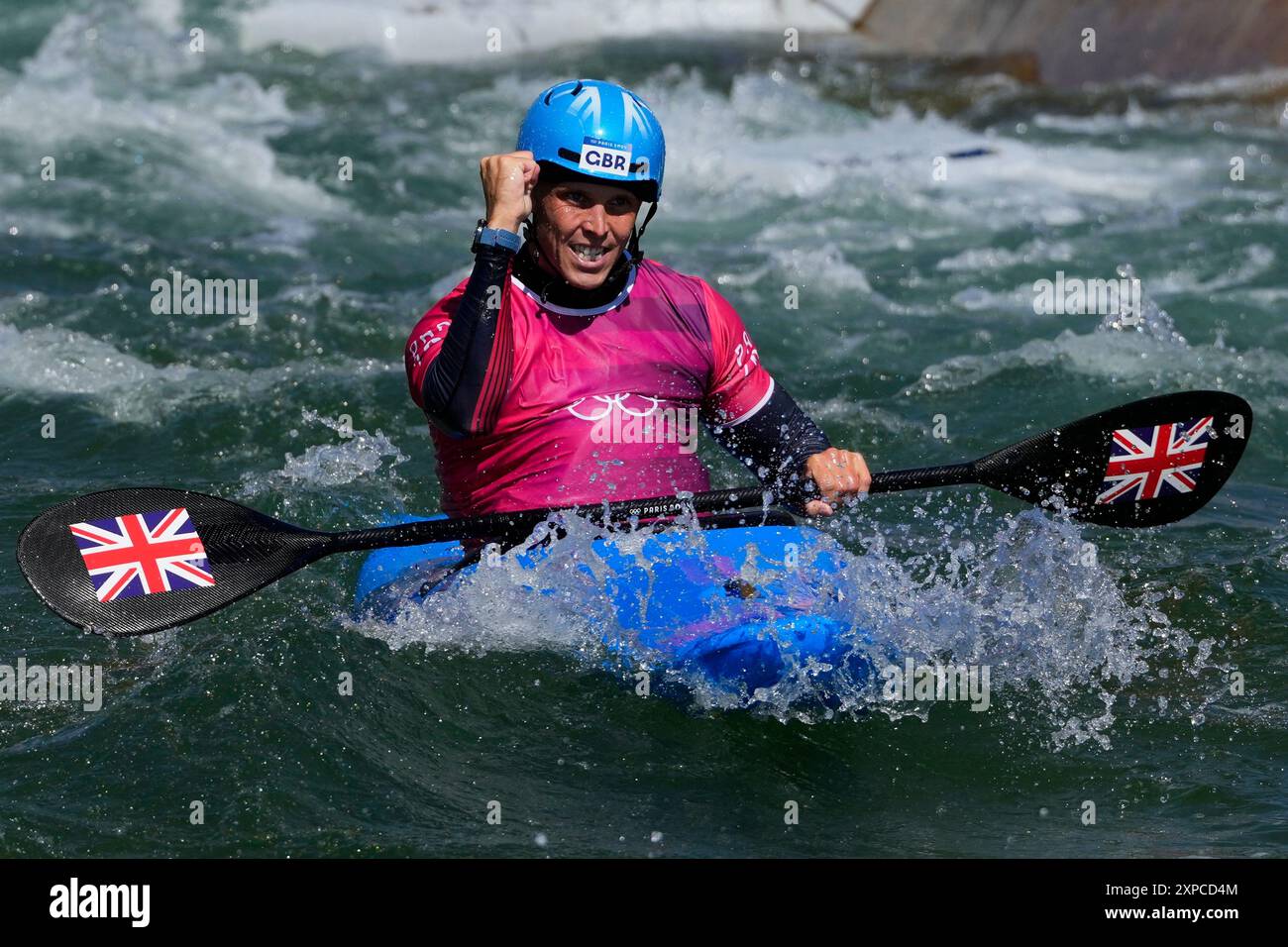 Joseph Clarke of Britain reacts in the finish area of the men's kayak ...