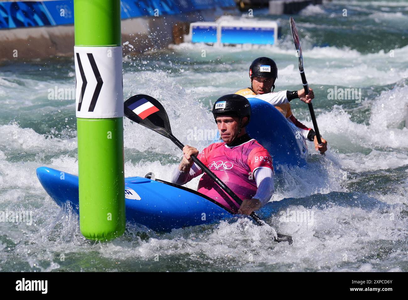 France's Boris Neveu (left) and Switzerland's Martin Dougoud compete in ...