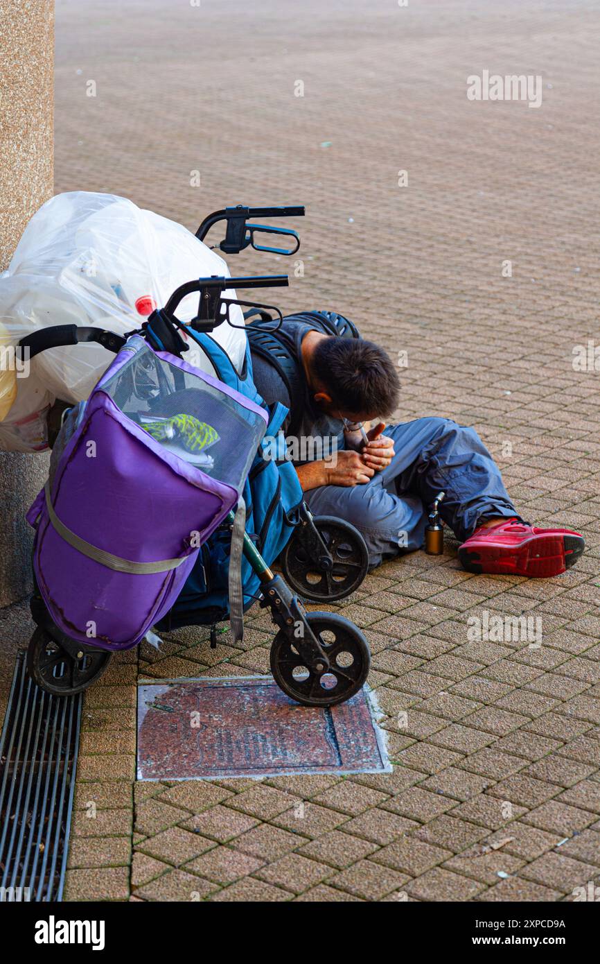 Homeless person by the Vancouver Public Library in Canada Stock Photo ...