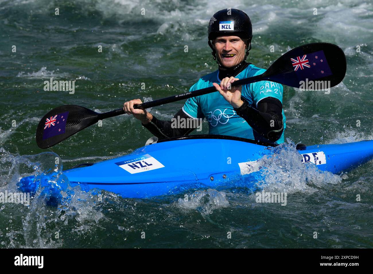 Finn Butcher of New Zealand reacts in the finish area of the men's ...