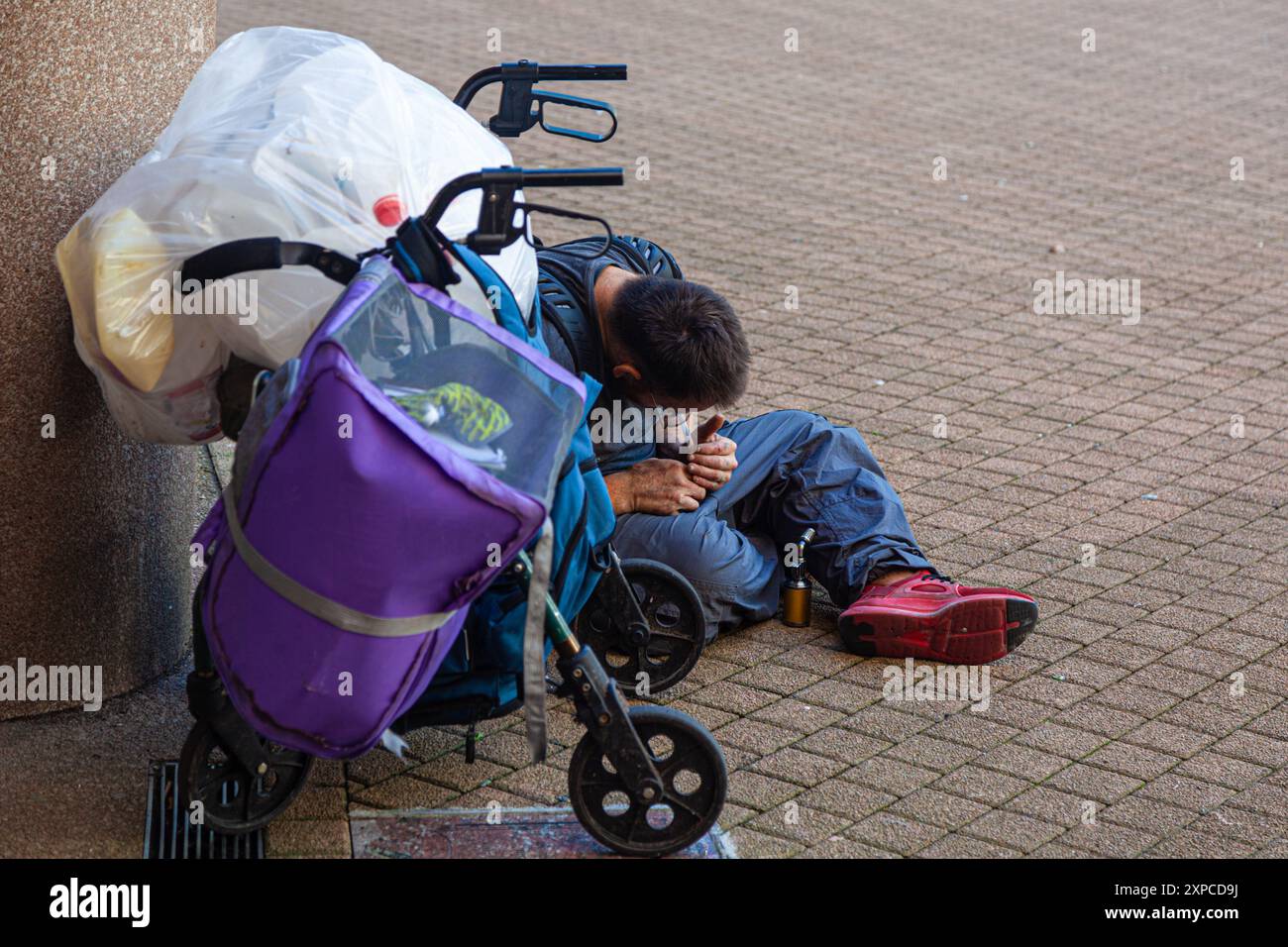 Homeless person by the Vancouver Public Library in Canada Stock Photo ...