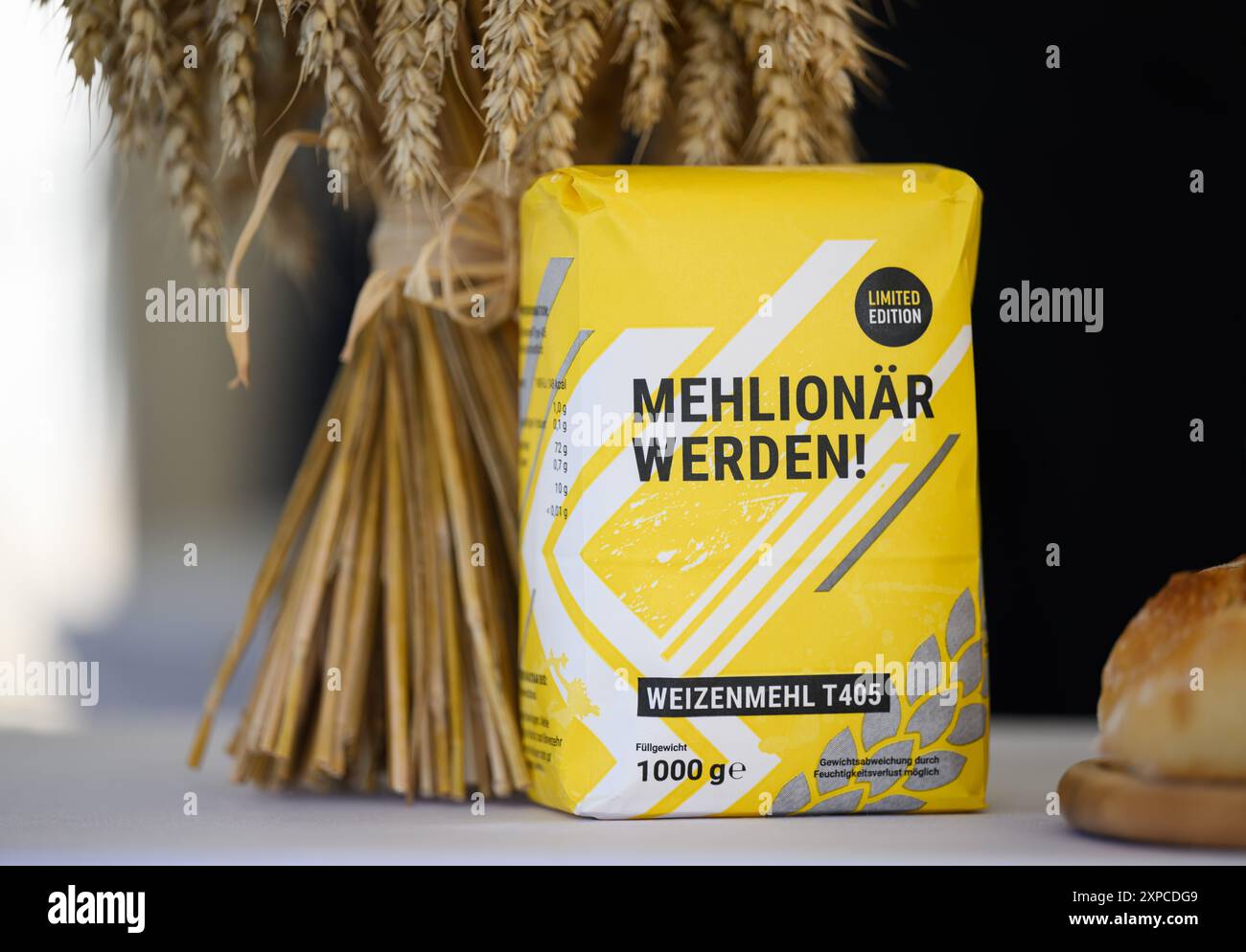 05 August 2024, Saxony, Dresden: A bag of wheat flour with the ...