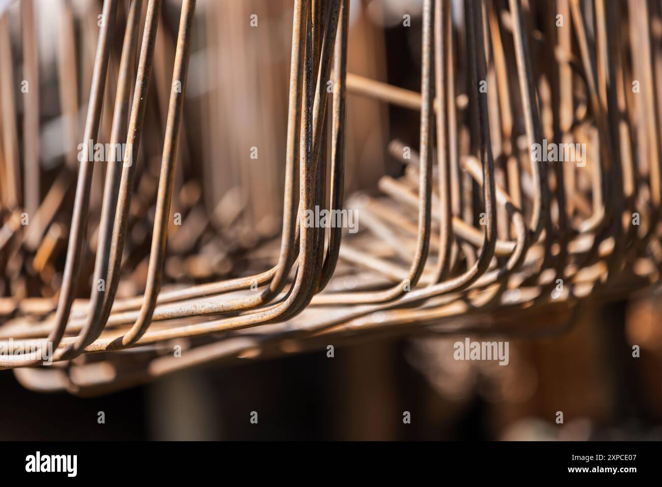 Rusty steel rods for reinforcement strapping, close-up abstract ...