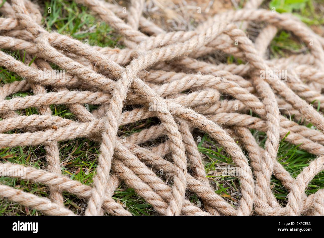 Nautical ropes lay on the ground, close-up photo Stock Photo - Alamy