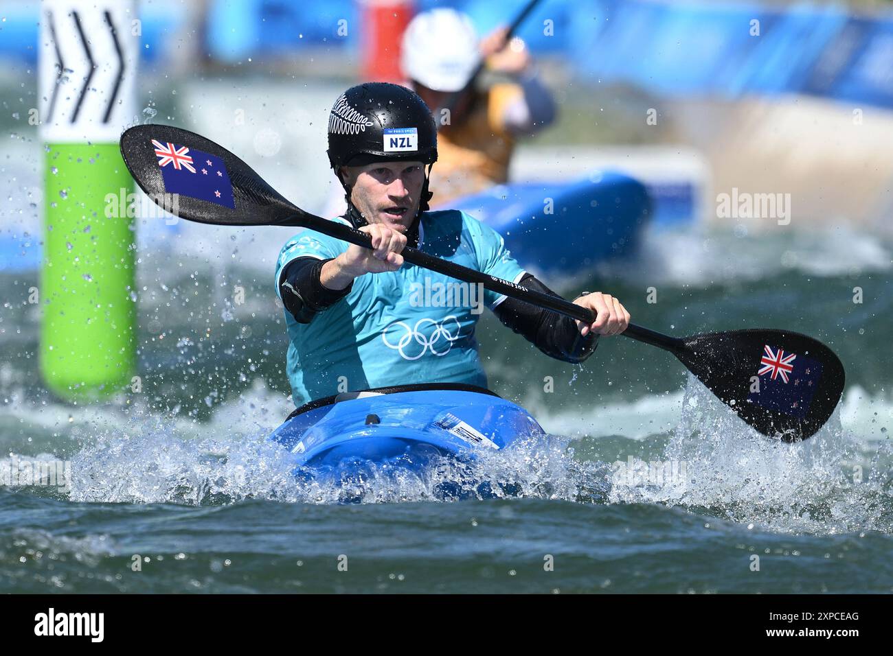 Finn Butcher of New Zealand in action during the Men's kayak cross ...