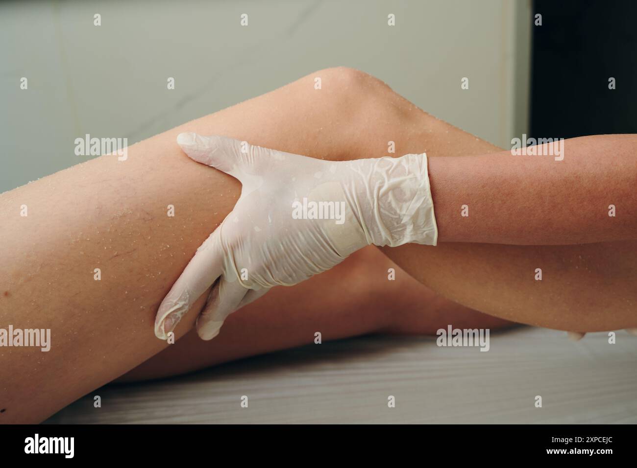 Medical Professional Examining Patient's Leg During Routine Checkup at ...