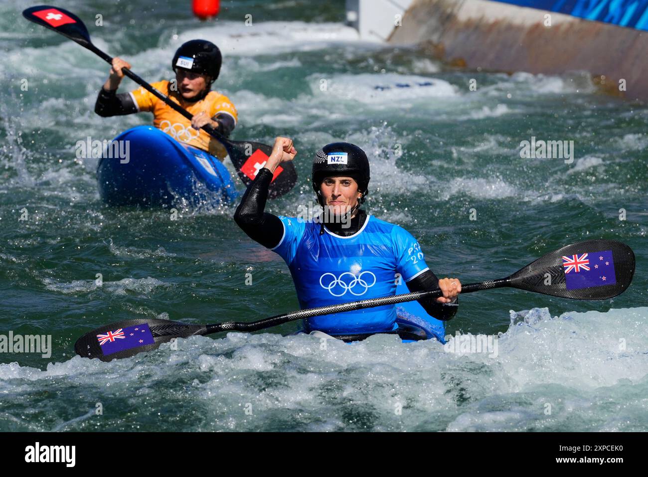 Luuka Jones of New Zealand reacts at the end of the women's kayak cross ...