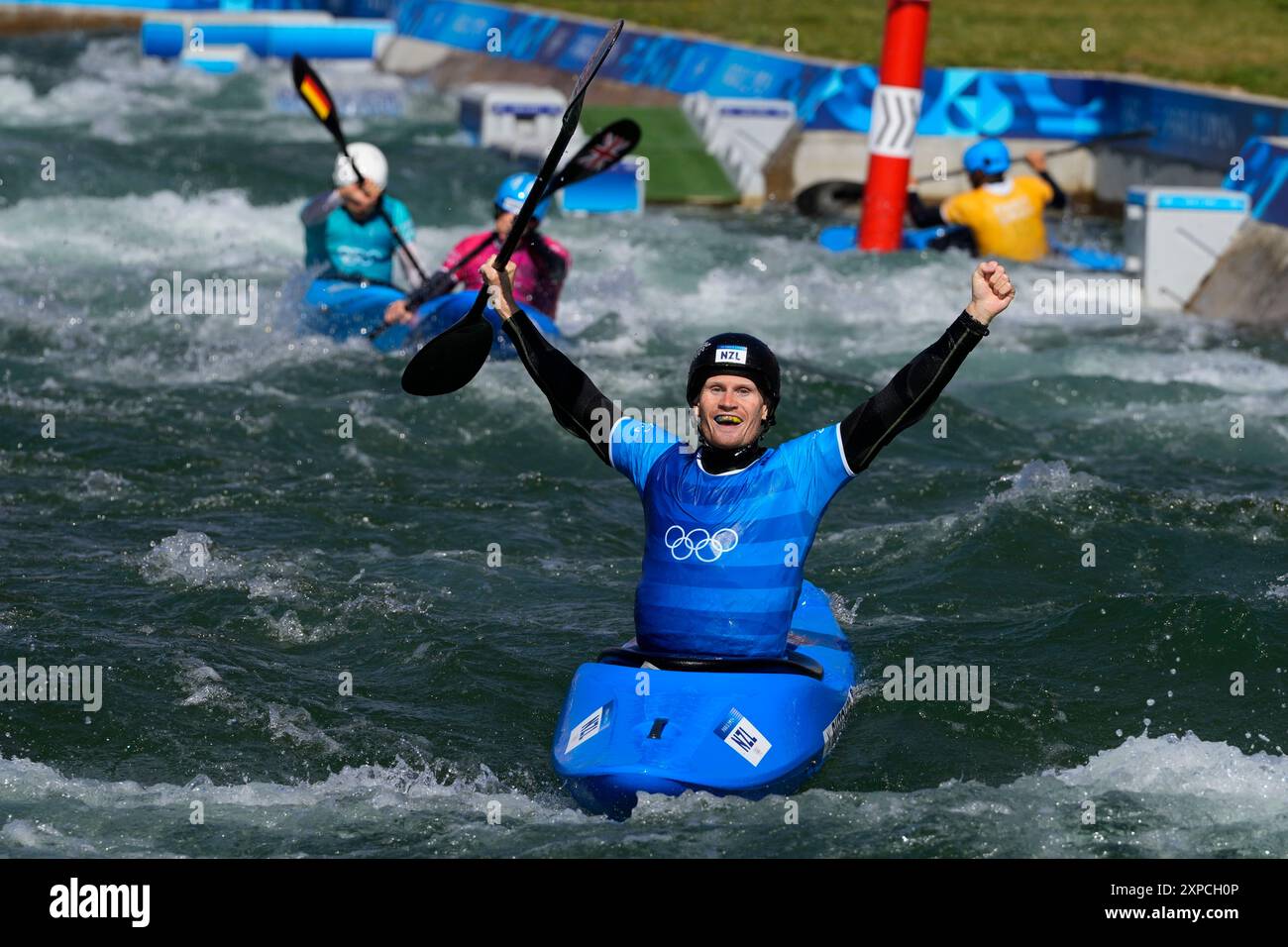 Finn Butcher of New Zealand reacts to winning gold in the men's kayak ...