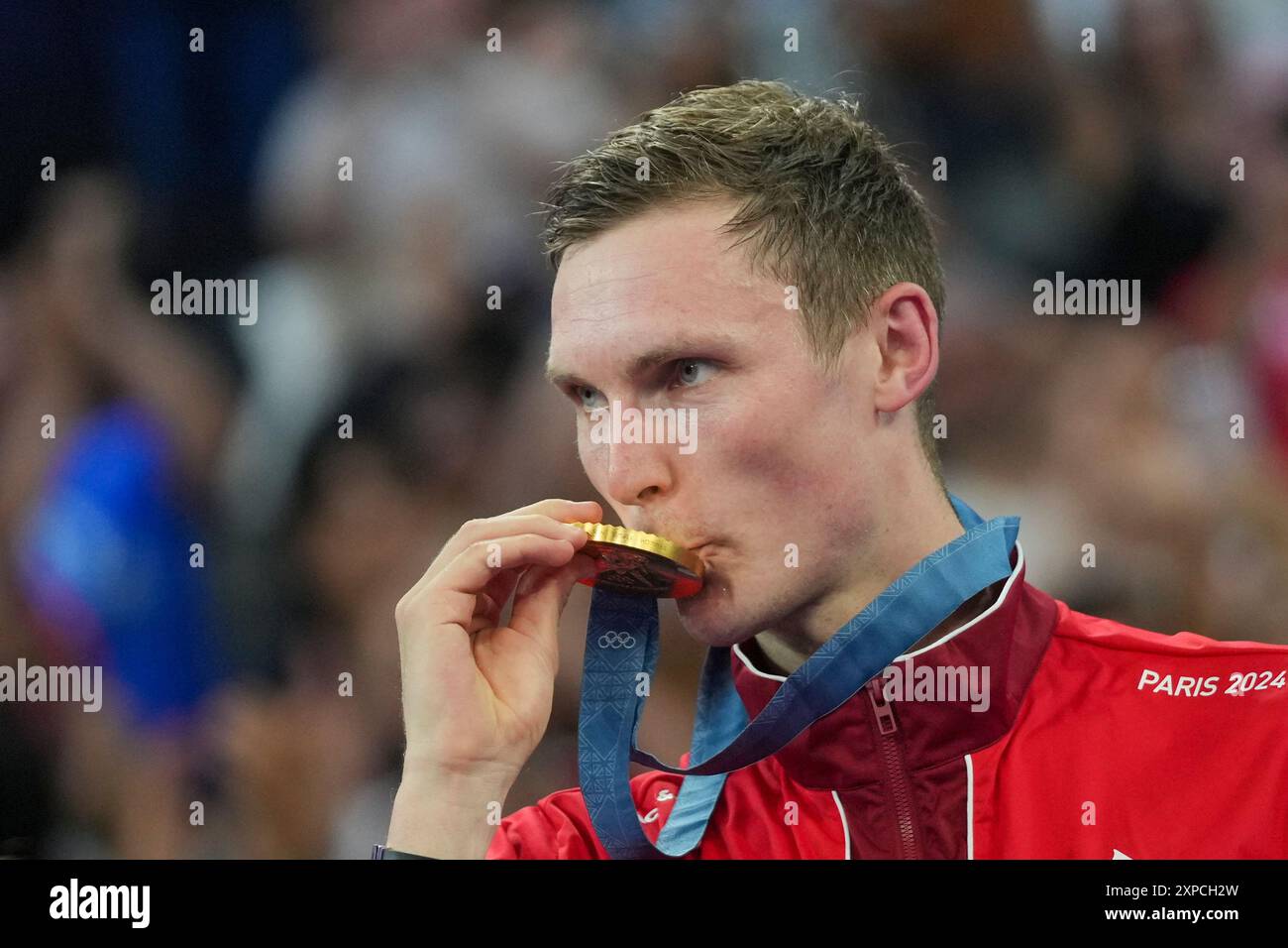 Denmark's Viktor Axelsen celebrates after winning the gold medal at the ...
