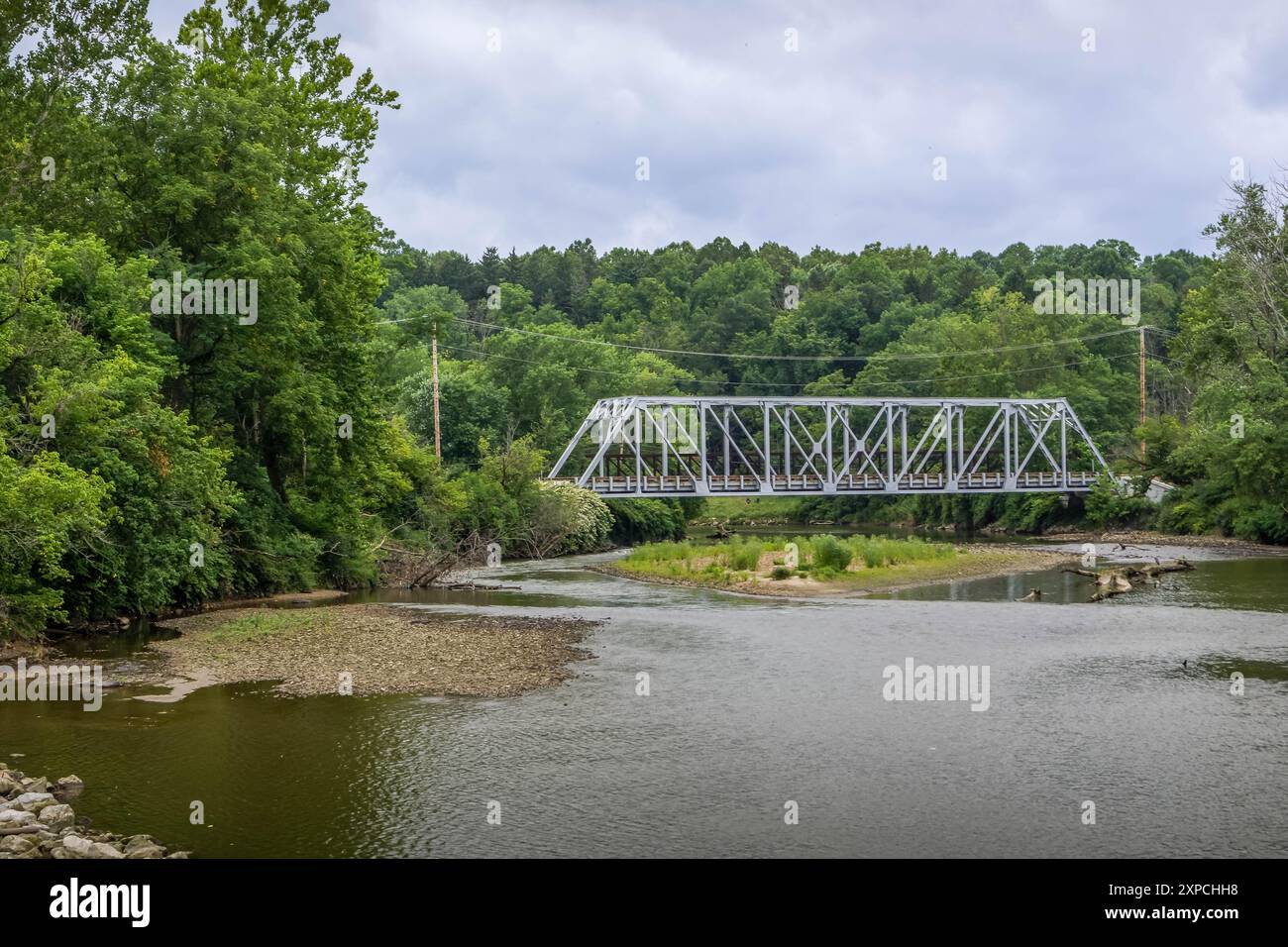 The iron bridge across Cuyahoga river on Ohio, with the automotive road ...