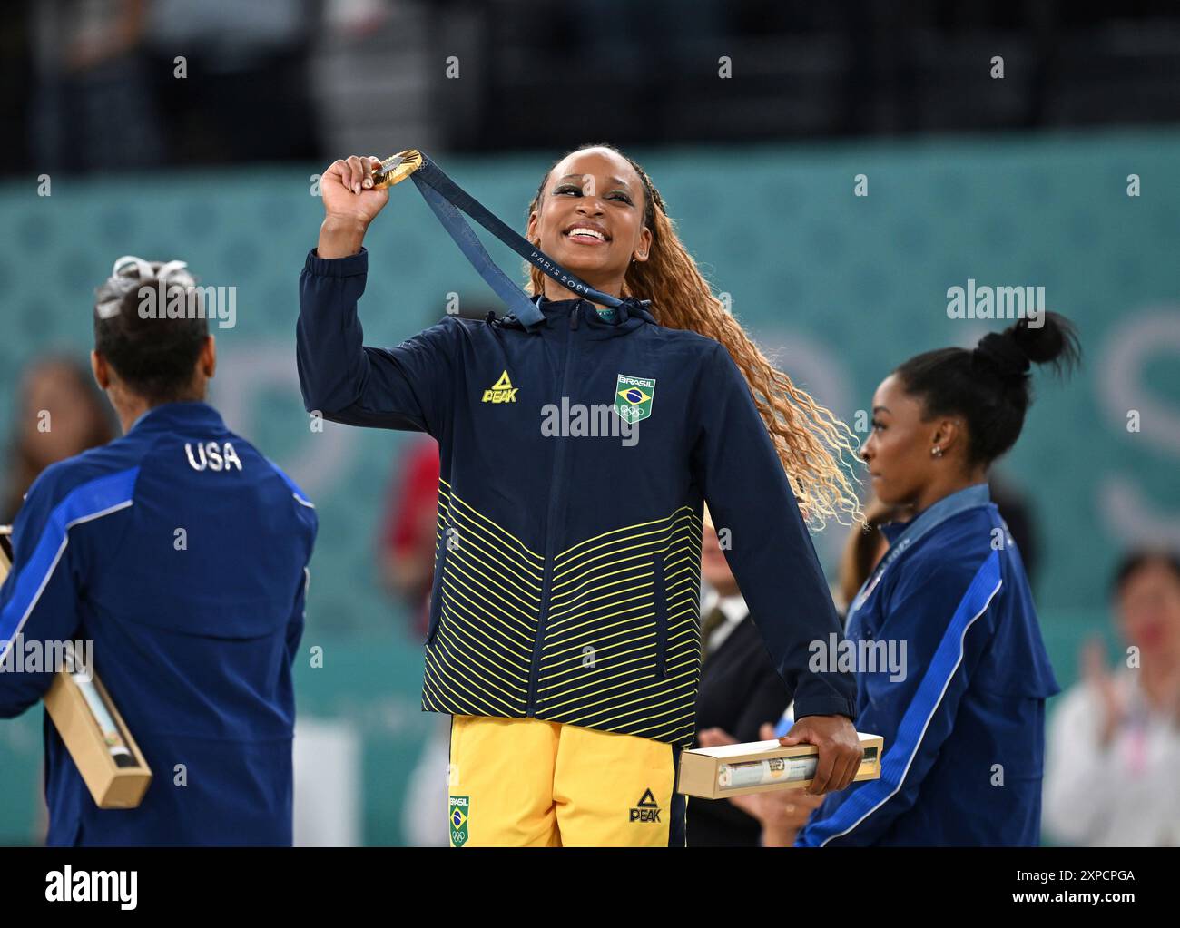ANDRADE Rebeca of Brazil (C) reacts, raising her gold medal during a ...