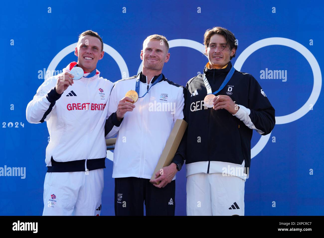 Silver medalist, from left, Joseph Clarke of Britain, gold medalist ...