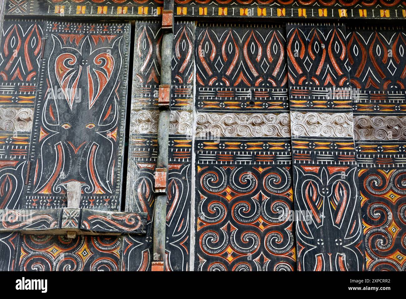 Beautiful traditional woodcarvings and paintings on rice granary in ...