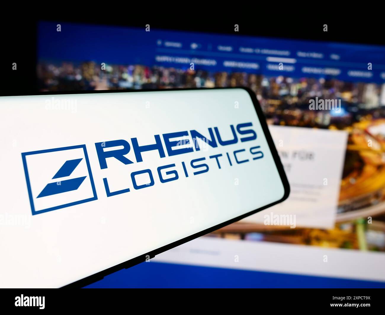Mobile phone with logo of German logistics company Rhenus SE Co. KG in ...