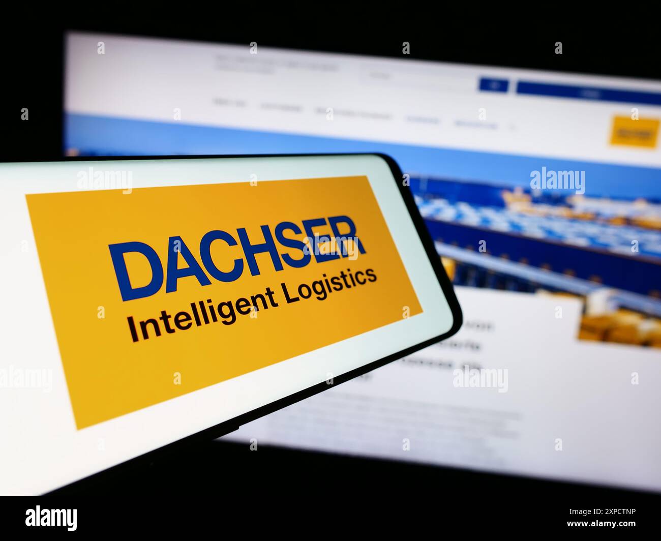 Smartphone with logo of German logistics company Dachser Group SE Co ...