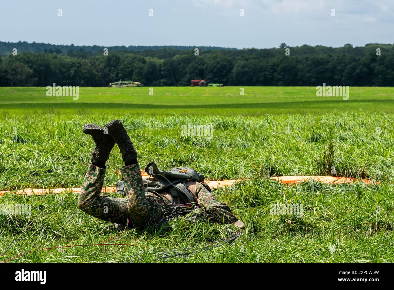 Paratrooper Team 45, Helmet 180 falling on the mark at the dropzone for ...