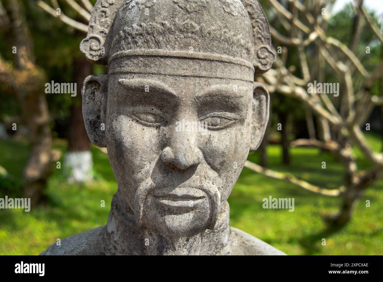 carved stone mandarin statues guard the emperor Ming Mang's mausoleum ...