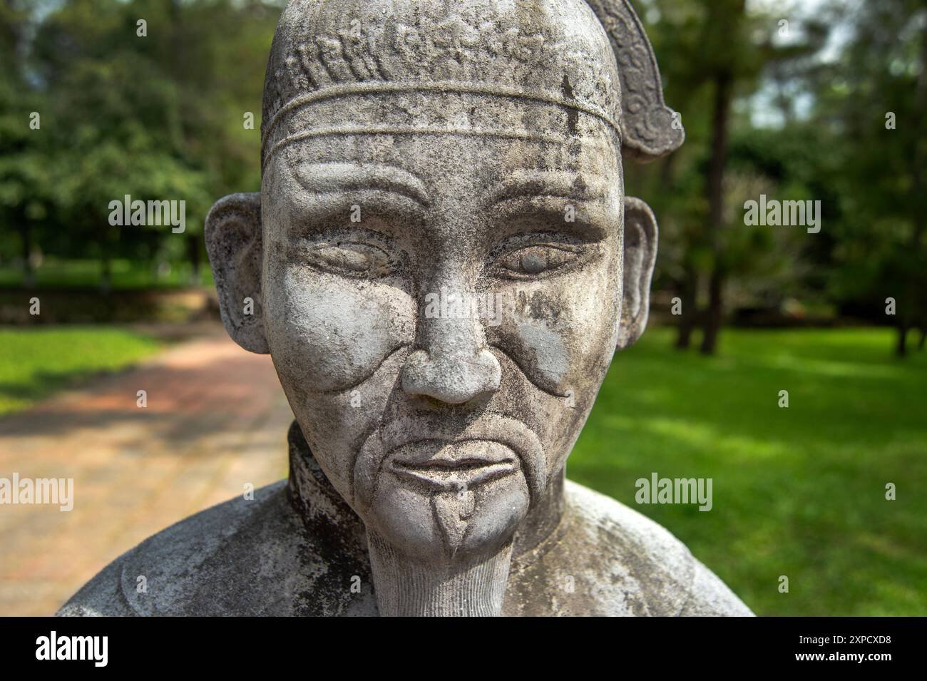 carved stone mandarin statues guard the emperor Ming Mang's mausoleum ...
