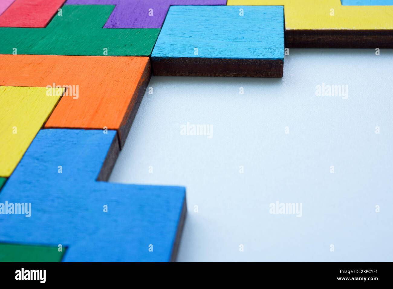 Parts of a colored geometric puzzle. Creative thinking and the solution ...