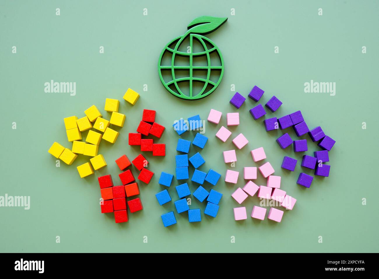 Green planet and groups of colored cubes. Sustainable Communities or ...