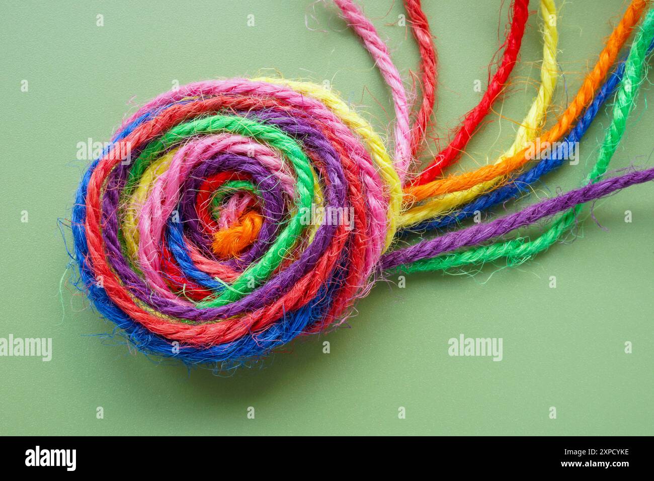 A ball of multi-colored threads. Unity and togetherness Stock Photo - Alamy