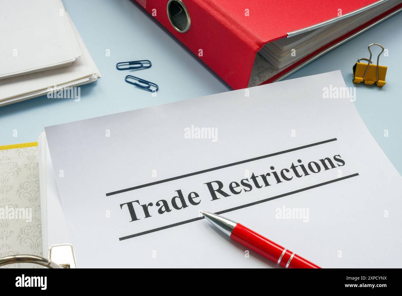 Open folder with document trade restrictions for sanctions Stock Photo ...